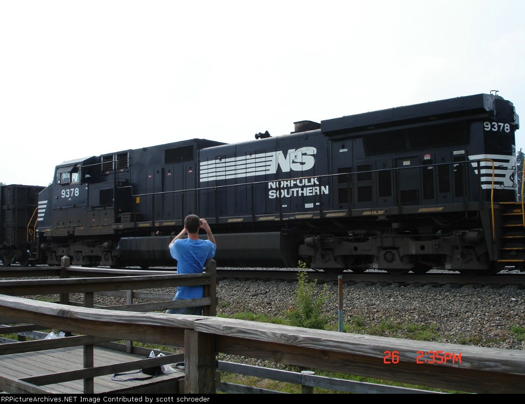 NS 9378 runs long hood forward as the fourth unit EB